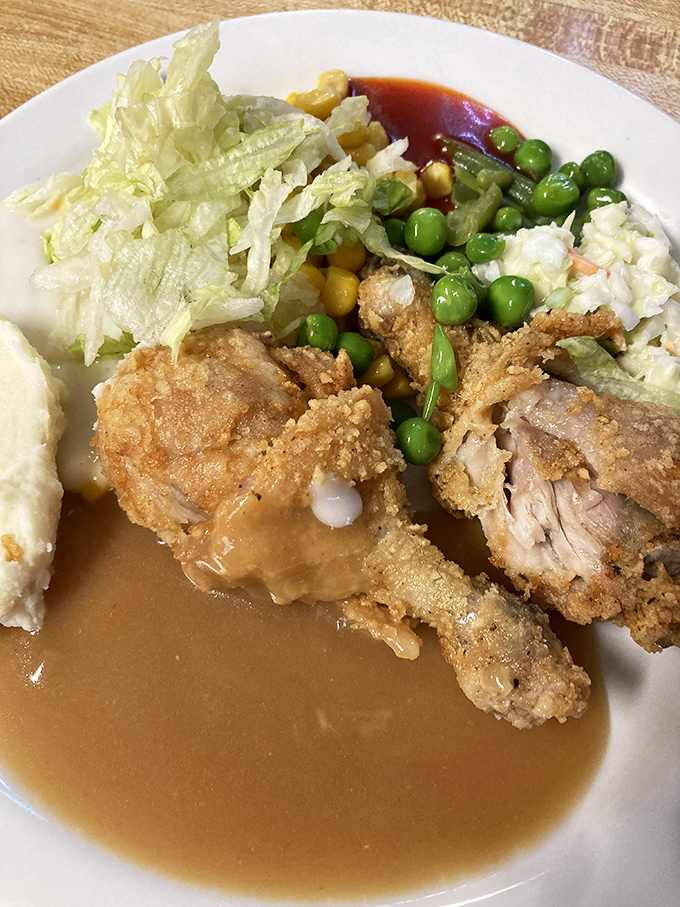 Fried chicken joins the catfish in a crispy duet that would make Colonel Sanders weep.