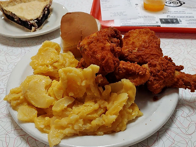 Golden-fried chicken alongside mac and cheese that's unapologetically yellow&mdash;comfort food that hugs your soul before it fills your stomach.
