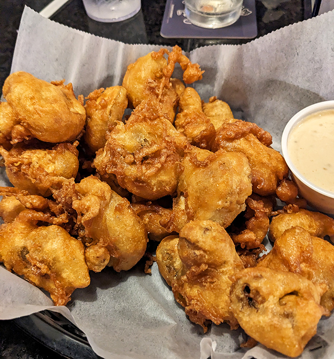 Golden-fried mushrooms that would make any inmate trade their last cigarette. The dipping sauce is practically contraband.