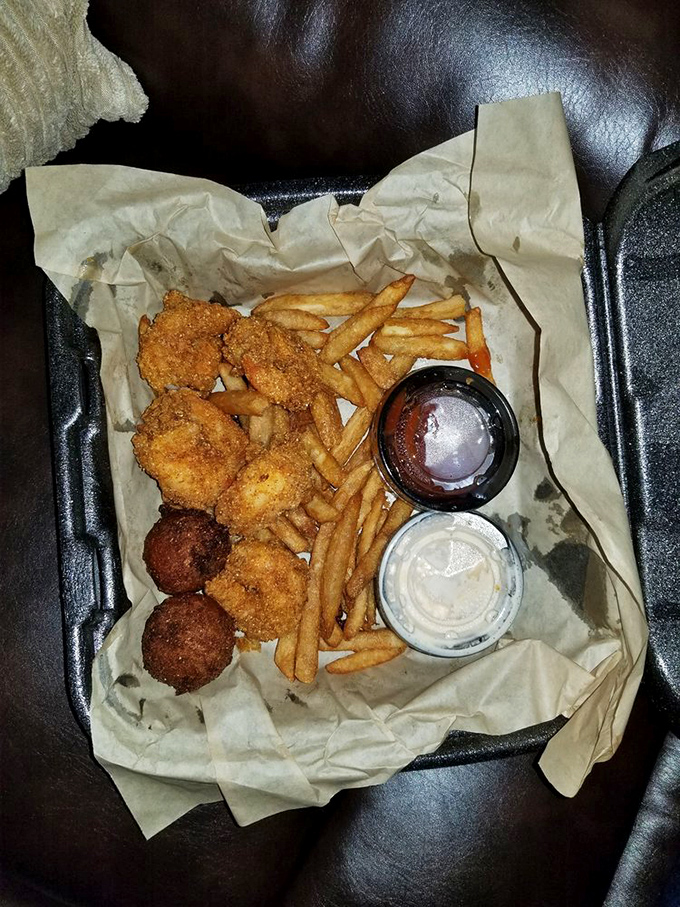 Golden-fried treasures nestled beside crispy fries&mdash;proof that sometimes the simplest pleasures deliver the most profound satisfaction.