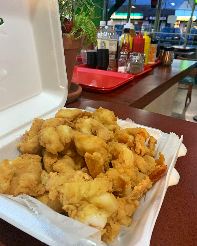 The star of the show: fried shrimp with a delicate coating that shatters like glass, revealing sweet, succulent treasures within.