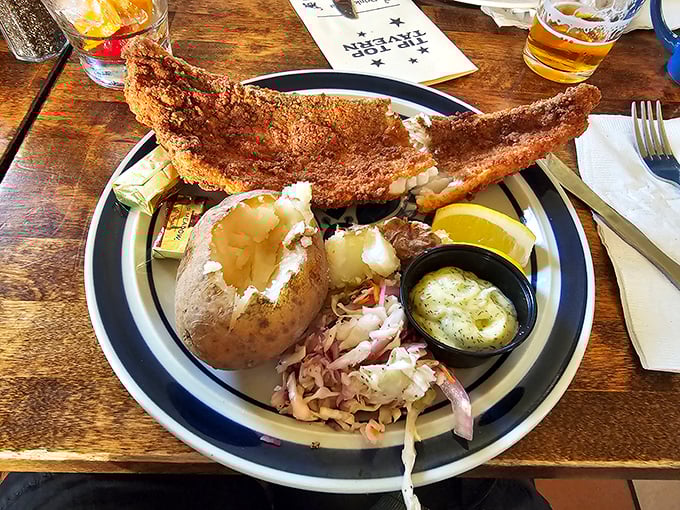 The star of the show: walleye with a golden crust that shatters with each bite, served with the kind of coleslaw that makes vegetables exciting again.