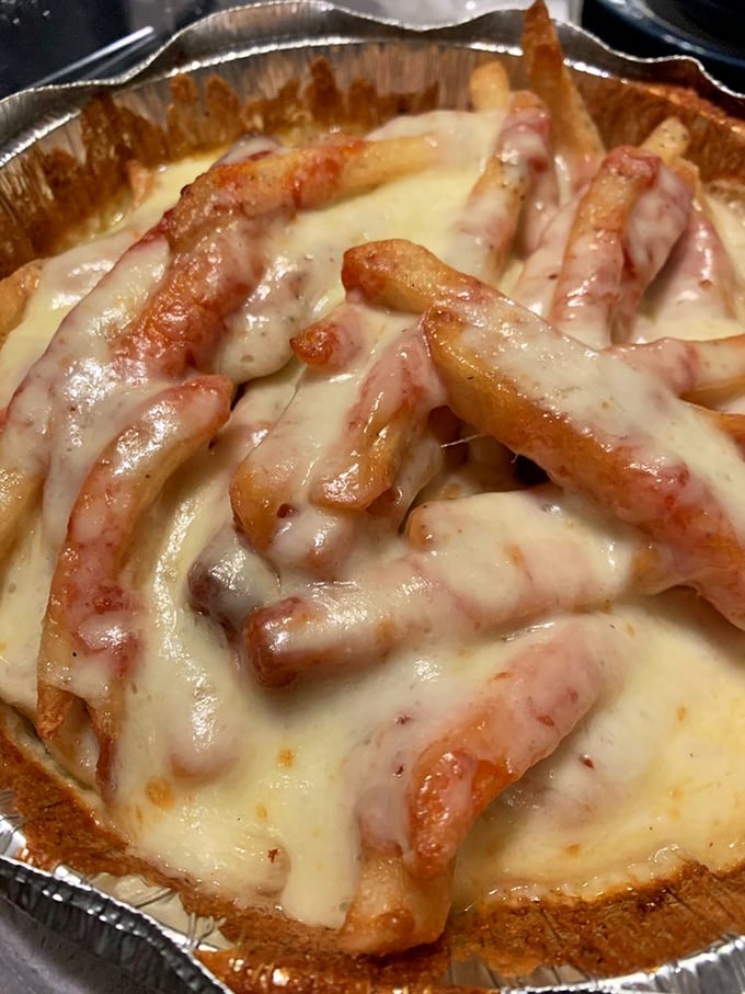 Cheese fries that make you question why anyone would ever eat them any other way&mdash;golden, crispy, and draped in a molten cheese embrace.