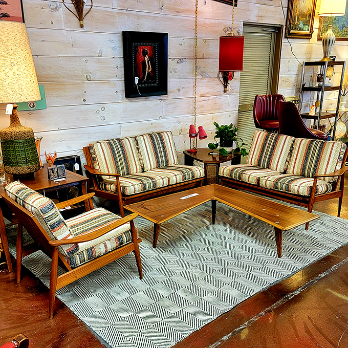 This living room setup isn't just furniture&mdash;it's a mid-century modern support group ready to cradle your streaming marathons in style.