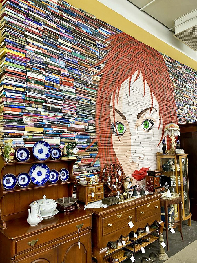 The book portrait watches over blue and white china, vintage furniture, and the ghosts of dinner parties past. Mid-century meets literary artistry.