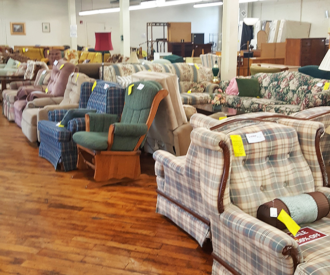 The furniture showroom resembles a living room family reunion. These well-loved sofas and chairs have stories to tell and new memories to make.