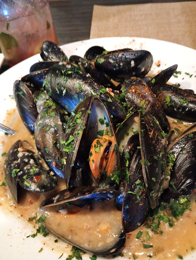 These glistening mussels swim in a garlic white wine sauce that you'll want to bottle and take home. Don't be shy about asking for extra bread.