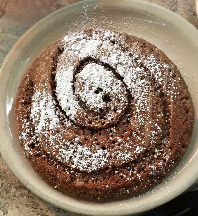 This chocolate pancake spiral isn't just breakfast – it's a dessert that somehow got security clearance to show up before noon.