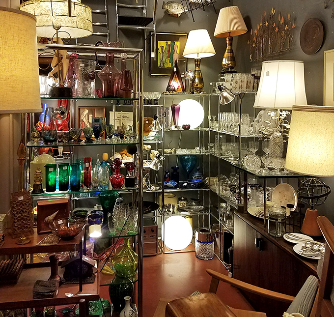 Sunlight dances through decades of glassware, creating a kaleidoscope of colors. Mid-century design never looked so tempting.