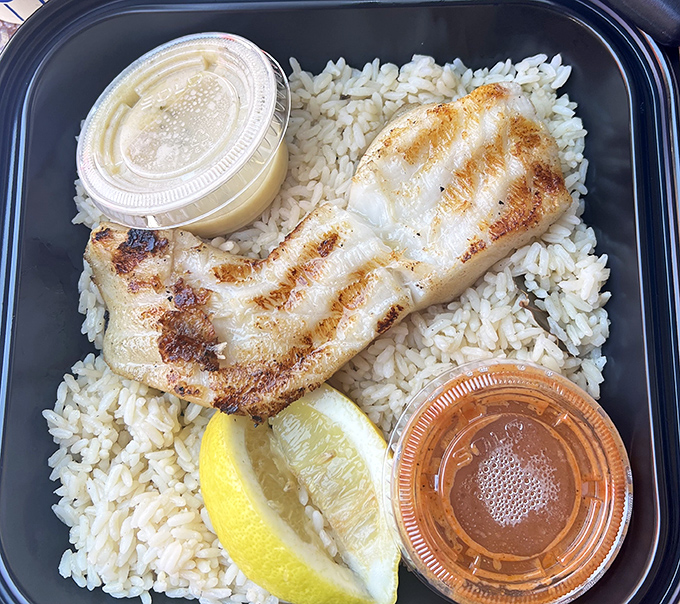 Simplicity at its finest. This perfectly grilled fish fillet proves that sometimes the best culinary magic requires just a hot grill and fresh catch.