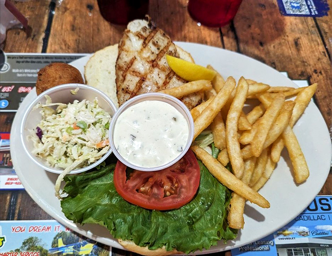 This isn't just a sandwich; it's Florida's coastal bounty between bread &ndash; grilled grouper, fresh toppings, and a side of vacation vibes.