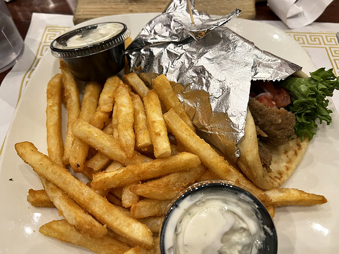 When a gyro and fries look this good, you know you've found a place that respects the art of lunch. That tzatziki sauce deserves its own fan club.