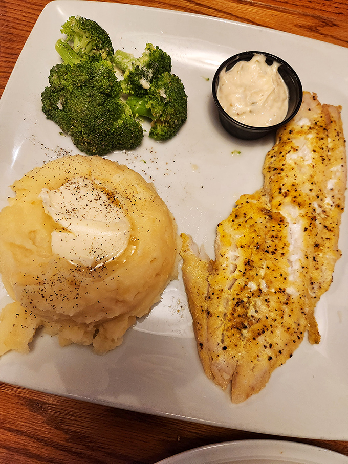 Perfectly seasoned fish alongside a cloud of mashed potatoes and vibrant broccoli. Comfort food that doesn't need a fancy introduction.
