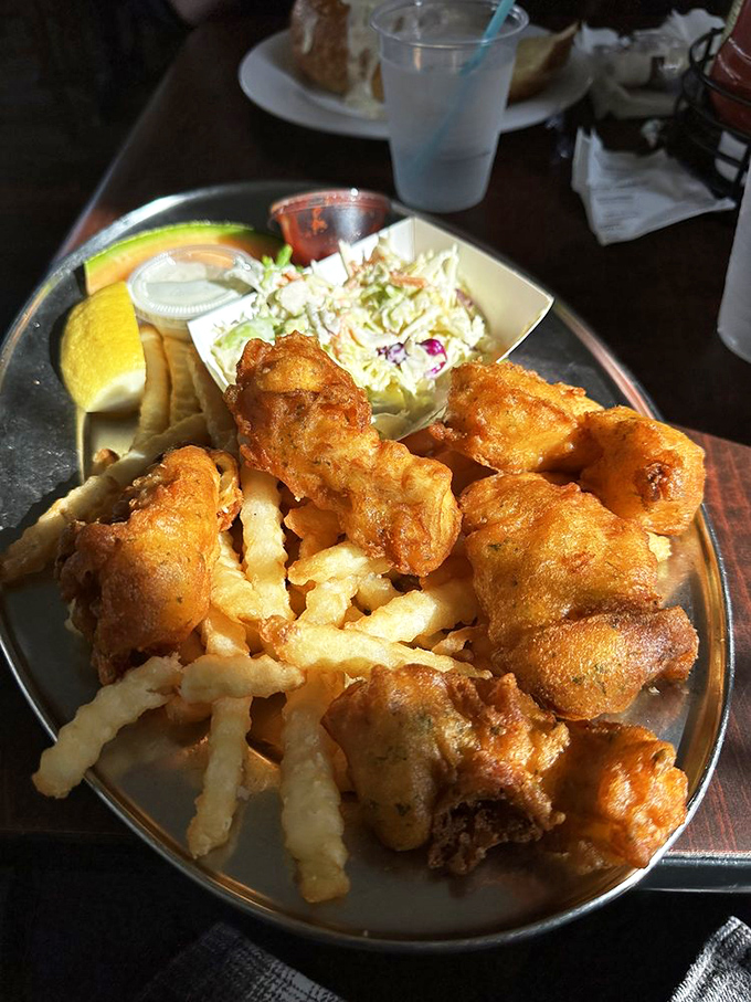 Fish and chips that would make a British pub owner weep with jealousy &ndash; golden, crispy batter protecting flaky white fish, with fries that demand to be fought over.