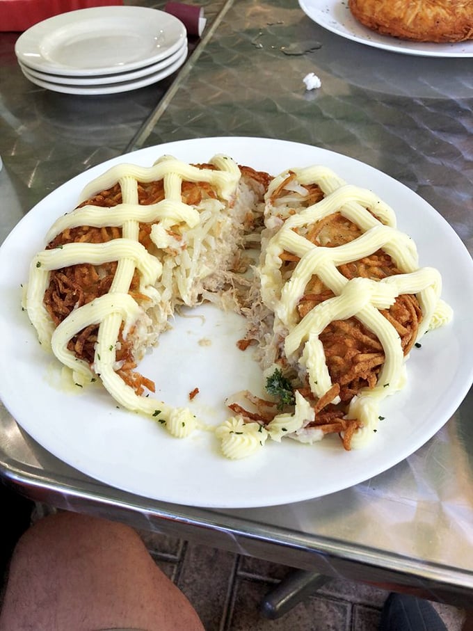 Behold the lattice-topped potato creation that makes hash browns look like they're not even trying&mdash;cheese stretches for days between each perfect, crispy bite. 