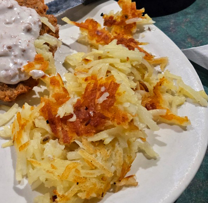 Crispy, golden hash browns that could make a potato farmer weep with pride. The perfect symphony of crunch and comfort.