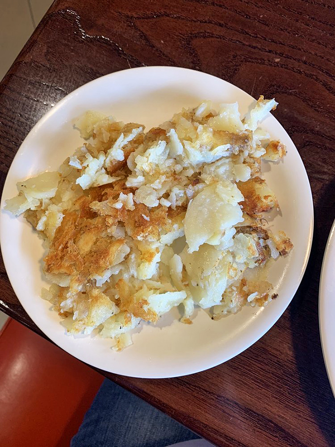 These aren't just home fries – they're golden nuggets of crispy-outside, fluffy-inside potato perfection that deserve their own fan club.