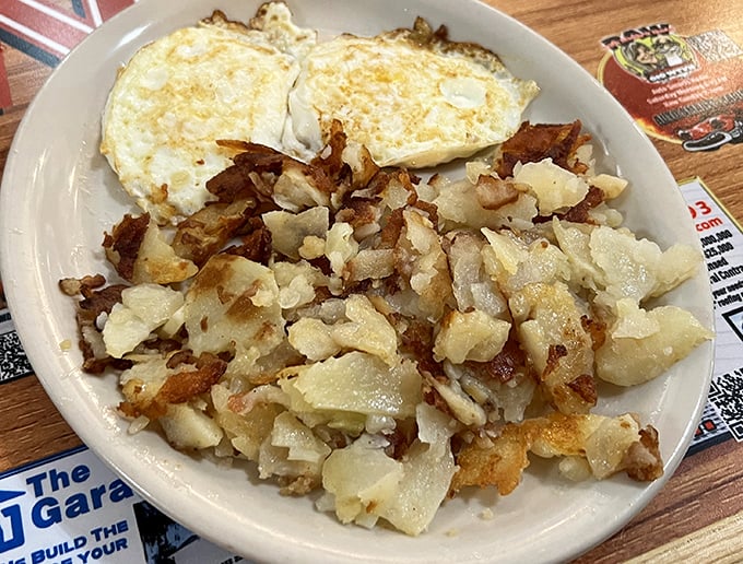 These home fries deserve their own fan club &ndash; crispy edges, tender centers, and that magical seasoning that comes from decades of the same well-seasoned griddle.
