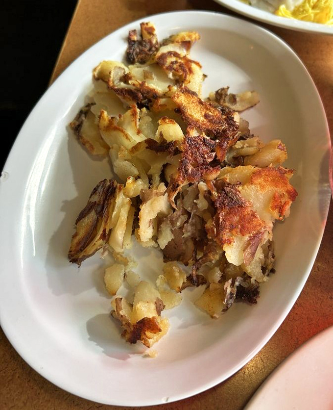 These home fries aren't just crispy&mdash;they've achieved that mythical balance of golden exterior and tender interior that potato scientists have sought for generations.