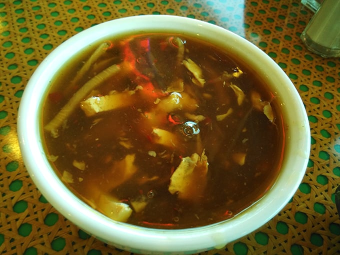 Hot and sour soup that dances on your tongue&mdash;a complex performance of flavors in a humble ceramic bowl.