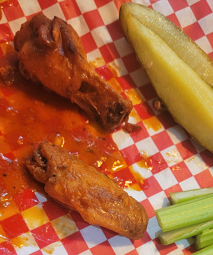 Buffalo wings with enough heat to wake you up faster than coffee. That pickle provides the perfect cool counterpoint to the sauce's kick.