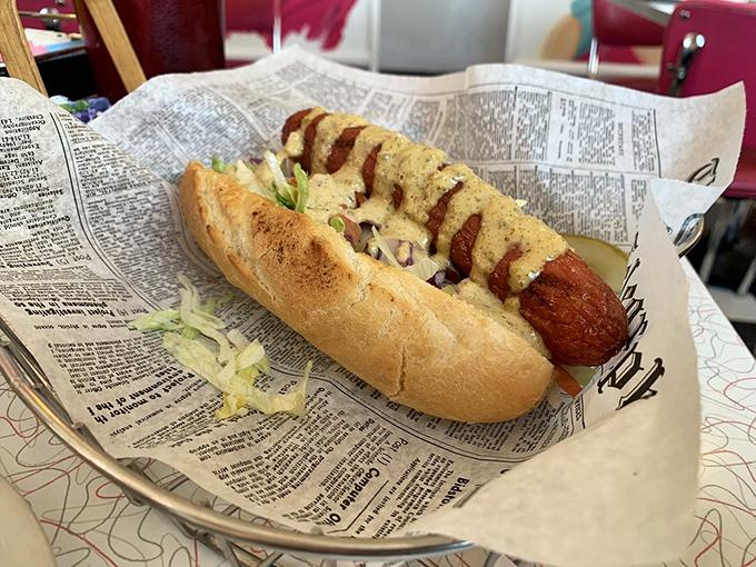 Not just any hot dog&mdash;this grilled beauty on newspaper is what your childhood memories wish they tasted like.