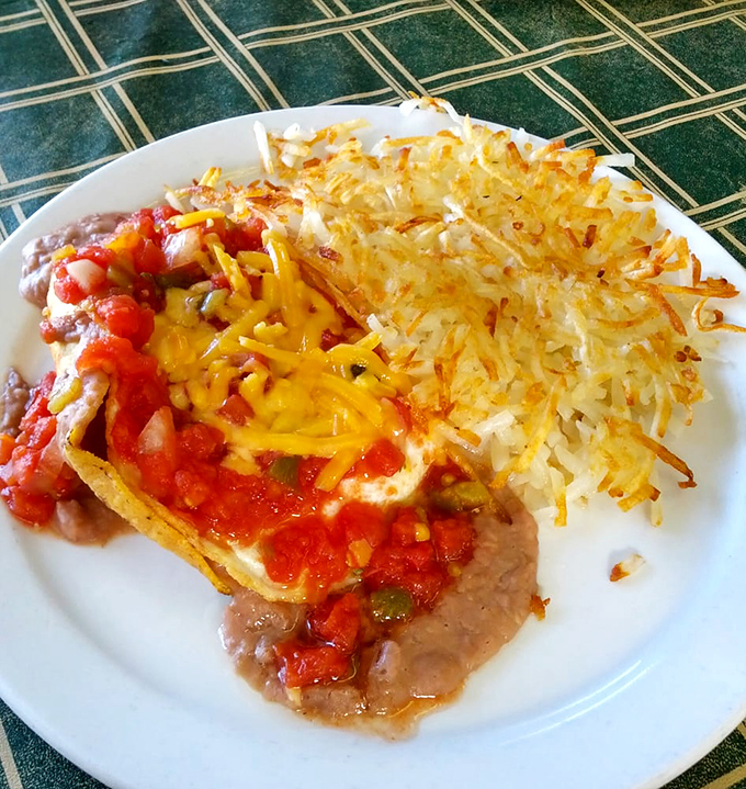 Huevos Rancheros that could make your grandmother weep with joy. The perfect marriage of eggs, salsa, and those impossibly crispy hash browns.