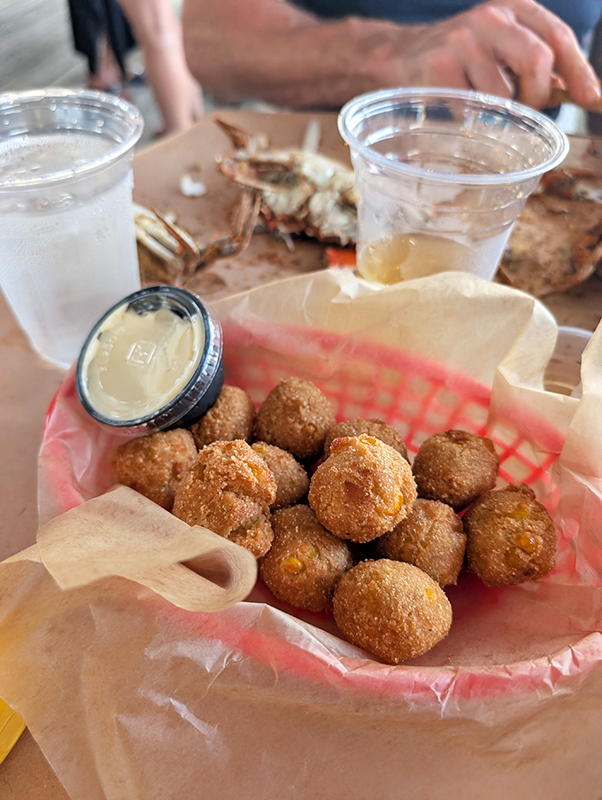 Hush puppies with a secret hint of sweetness, fried to golden perfection. These little spheres of joy are what cornmeal dreams about becoming.