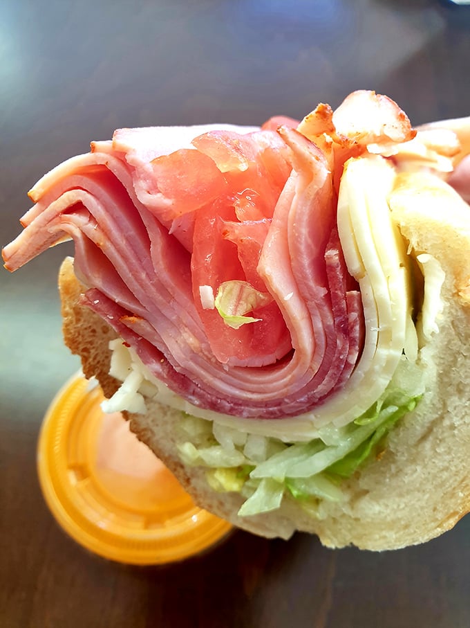 The star of the show! Layers of Italian meats, cheese, and veggies stacked with architectural precision. This hoagie isn't just a sandwich&mdash;it's a commitment.