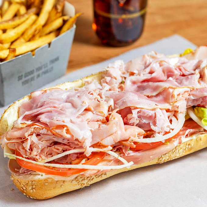 Italian hoagie artistry at its finest, with Dietz & Watson meats piled high like a delicious architectural masterpiece.