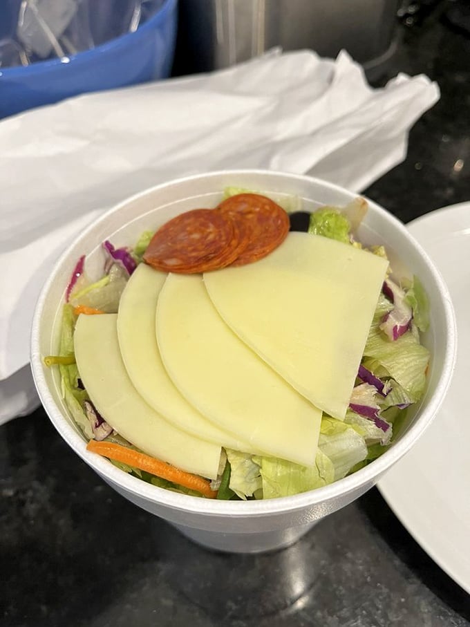 This isn't just a side salad&mdash;it's a supporting actor deserving its own award. Crisp, colorful, and topped with provolone that means business.