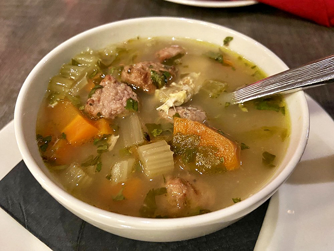 Italian Wedding Soup that could mend broken hearts and family feuds. Those tiny meatballs are punching way above their weight class.