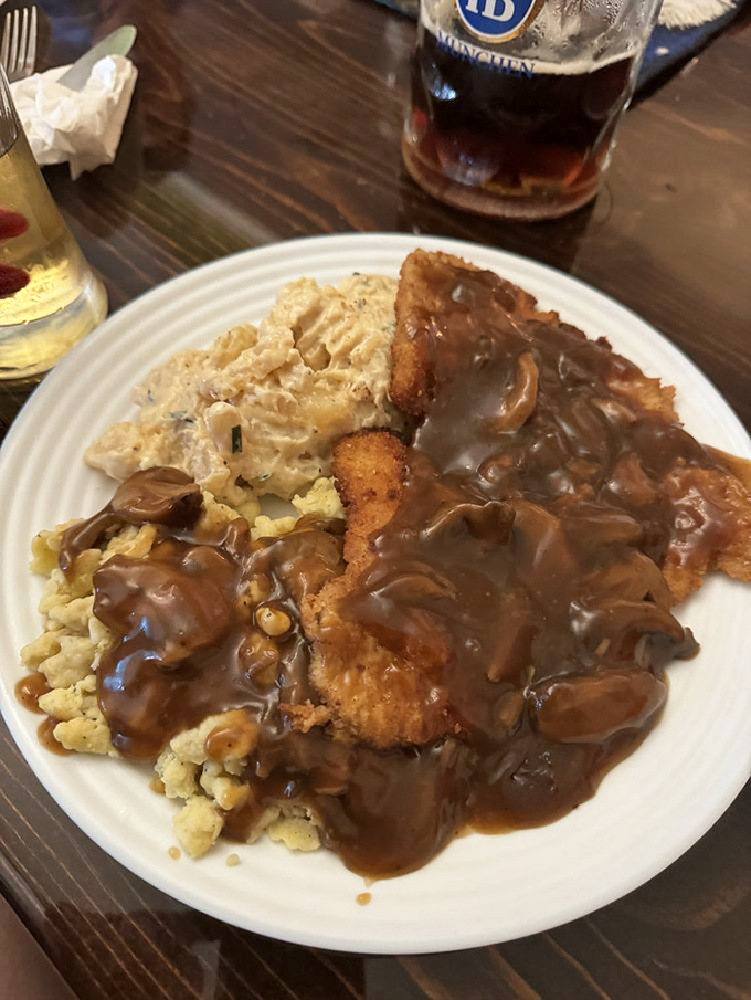 J&auml;gerschnitzel arrives golden and crispy, proving some culinary classics never need updating or modern interpretation.