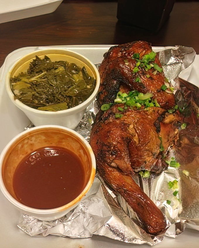 Jerked chicken that makes you wonder why you ever bothered with plain grilled chicken. The pickled red onions cut through the richness like comedic relief in a drama.