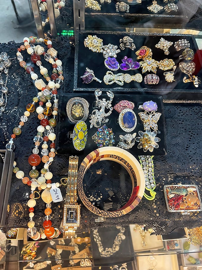 Costume jewelry that would make Elizabeth Taylor raise an approving eyebrow. One person's discarded statement piece becomes another's conversation starter at the next neighborhood potluck.