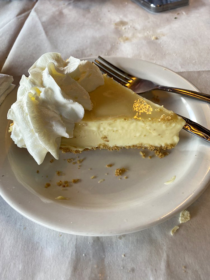 Key lime pie so authentic it should come with a tiny passport. That graham cracker crust deserves its own fan club.