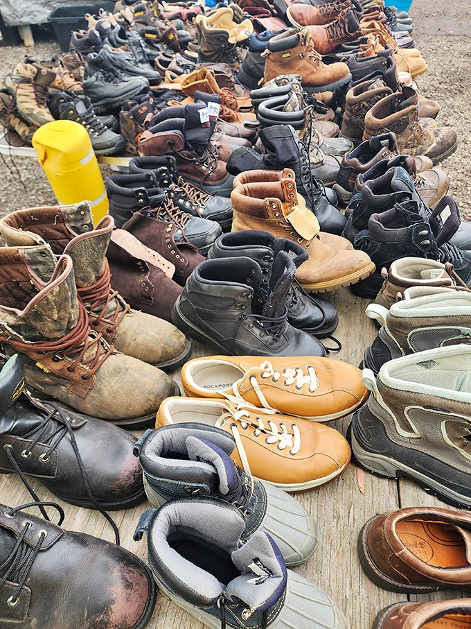 Work boots with stories to tell sit alongside pristine Rockports. Each pair waiting for new adventures or just a comfortable Sunday stroll.