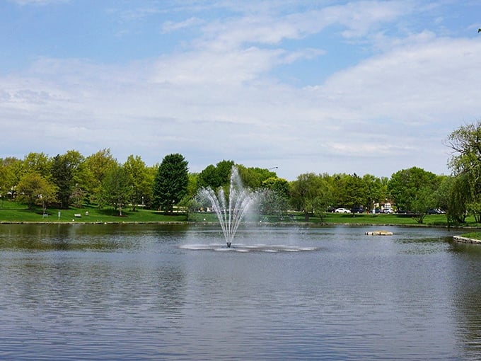 Even the fountain seems to perform, sending water skyward in a liquid ballet that hypnotizes visitors on sunny afternoons.