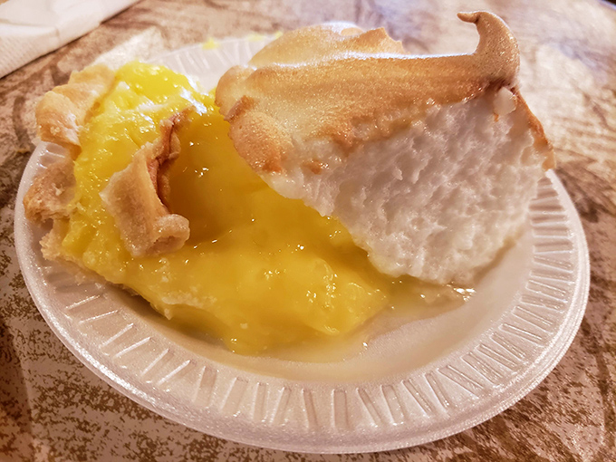 This lemon meringue pie doesn't just brighten your day &ndash; it's sunshine on a plate with that perfect sweet-tart balance that makes your taste buds high-five.