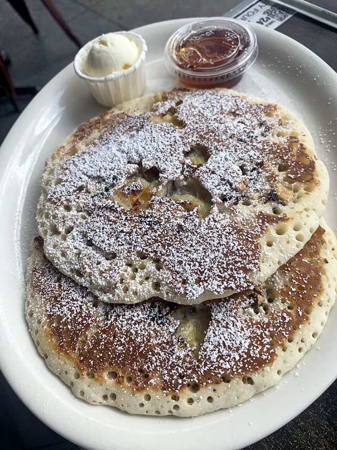 These lemon ricotta pancakes are so light and airy they might float off your plate if not anchored by powdered sugar.