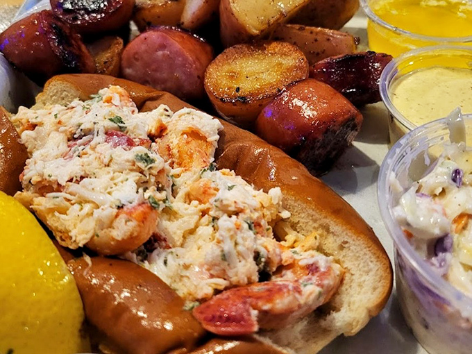 A lobster roll that would make a New Englander nod in respect. Served with sausage and potatoes, it's coastal comfort on a plate.