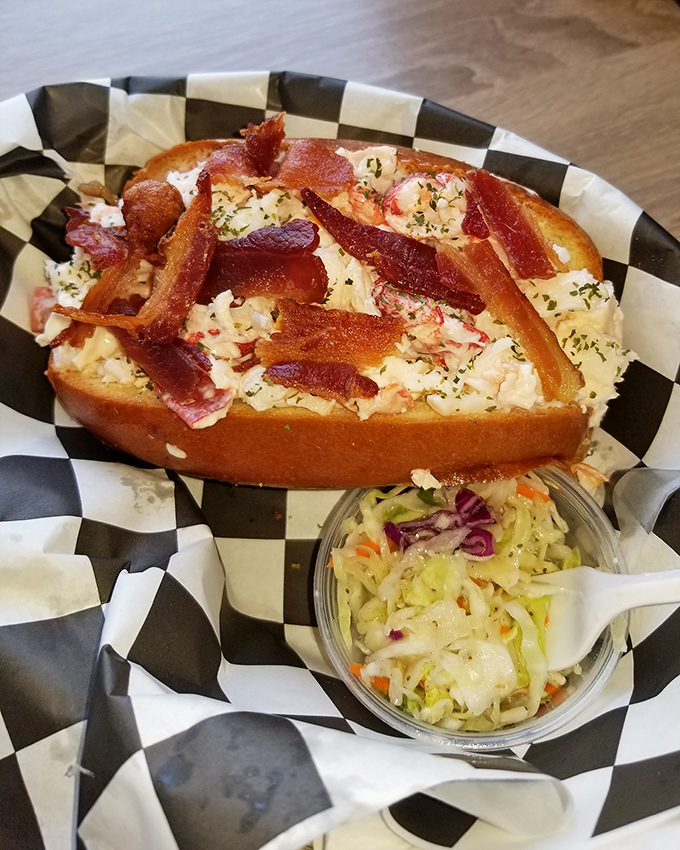 Lobster roll nirvana: buttery toasted bread cradling sweet meat topped with crispy bacon. Diet plans come here to die gloriously.