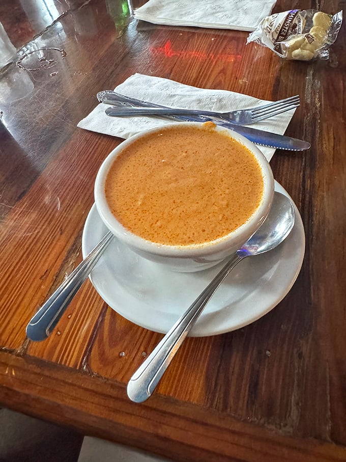 This bisque doesn't just warm your stomach; it hugs your soul. The rich amber color promises a depth of flavor that fancy restaurants charge triple for.