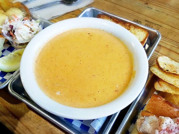 The lobster corn chowder glows like liquid gold &ndash; a bowl of comfort that somehow captures both New England tradition and California sunshine.