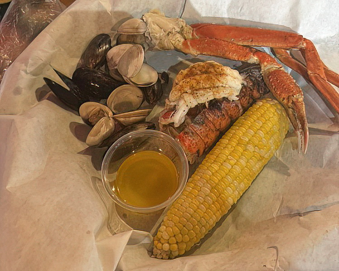 The seafood motherload: lobster tail, clams, mussels, and corn on the cob. It's like Neptune himself packed your lunch.