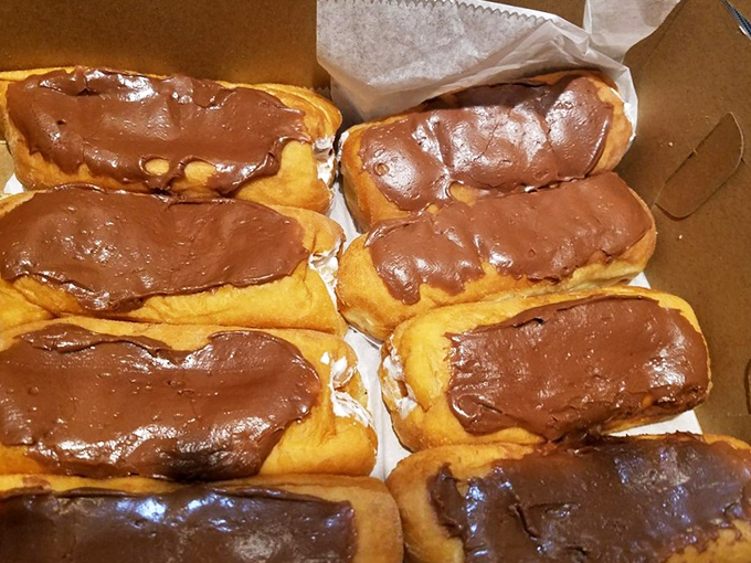 Long Johns lined up like delicious dominos, their chocolate frosting glistening under the bakery lights, daring you to start the cascade.