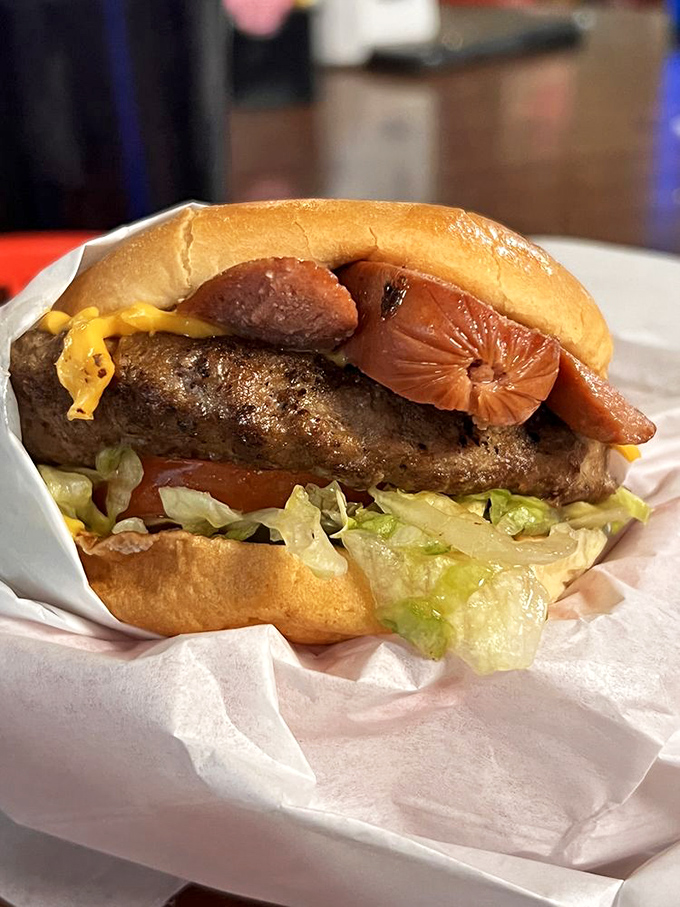 The Lutes Special Burger defies convention by adding a hot dog to the party &ndash; like inviting both Sinatra and Elvis to the same show.