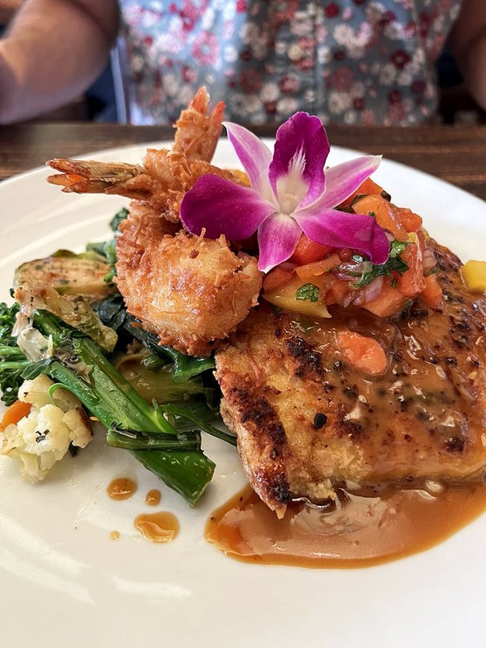 The presentation alone deserves applause&mdash;a perfectly seared halibut crowned with crispy shrimp and an edible purple flower. Eating art has never been so satisfying.