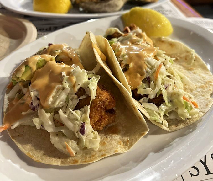 Mahi tacos that make you question why you ever ate anything else. The perfect marriage of crispy fish, crunchy slaw, and that sauce that ties it all together.