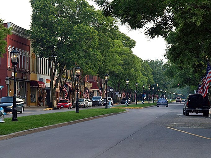 Stroll down Wellsboro's tree-lined Main Street where the grass median isn't just decorative &ndash; it's practically the town's front yard where community happens.